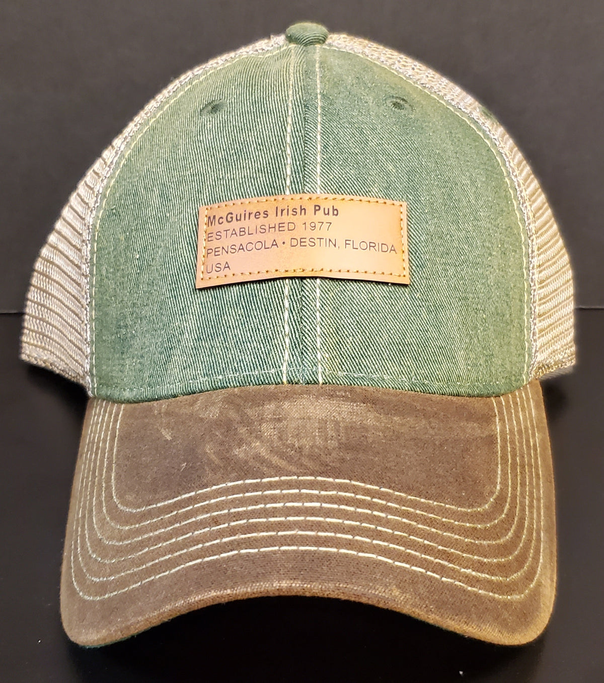 Leather Label Trucker Hat | McGuire's Irish Pub